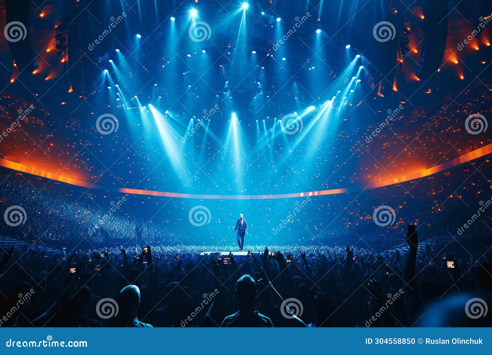Singer Performs a Musical Concert on Stage in a Huge Packed Stadium ...