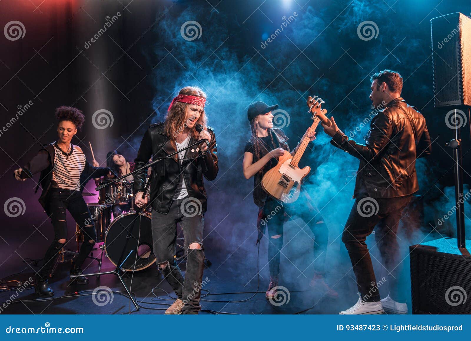 Singer with Rock and Roll Band Performing Music on Stage Stock Image ...