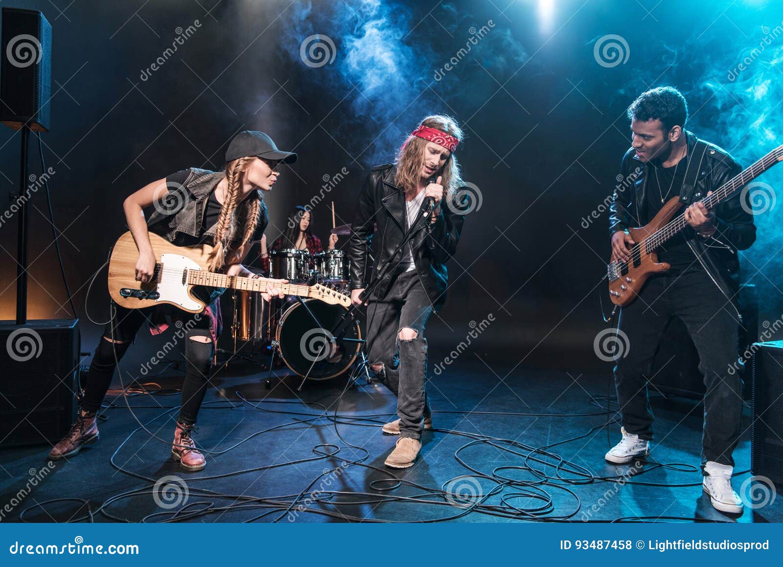 Singer with Rock and Roll Band Performing Music on Stage Stock Photo ...