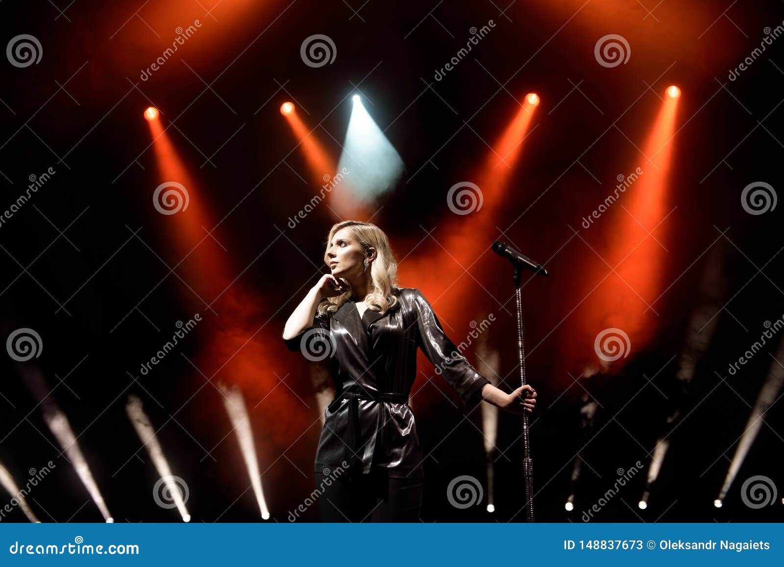 Singer on Scene in the Club. Bright Stage Lighting. Stock Image - Image ...