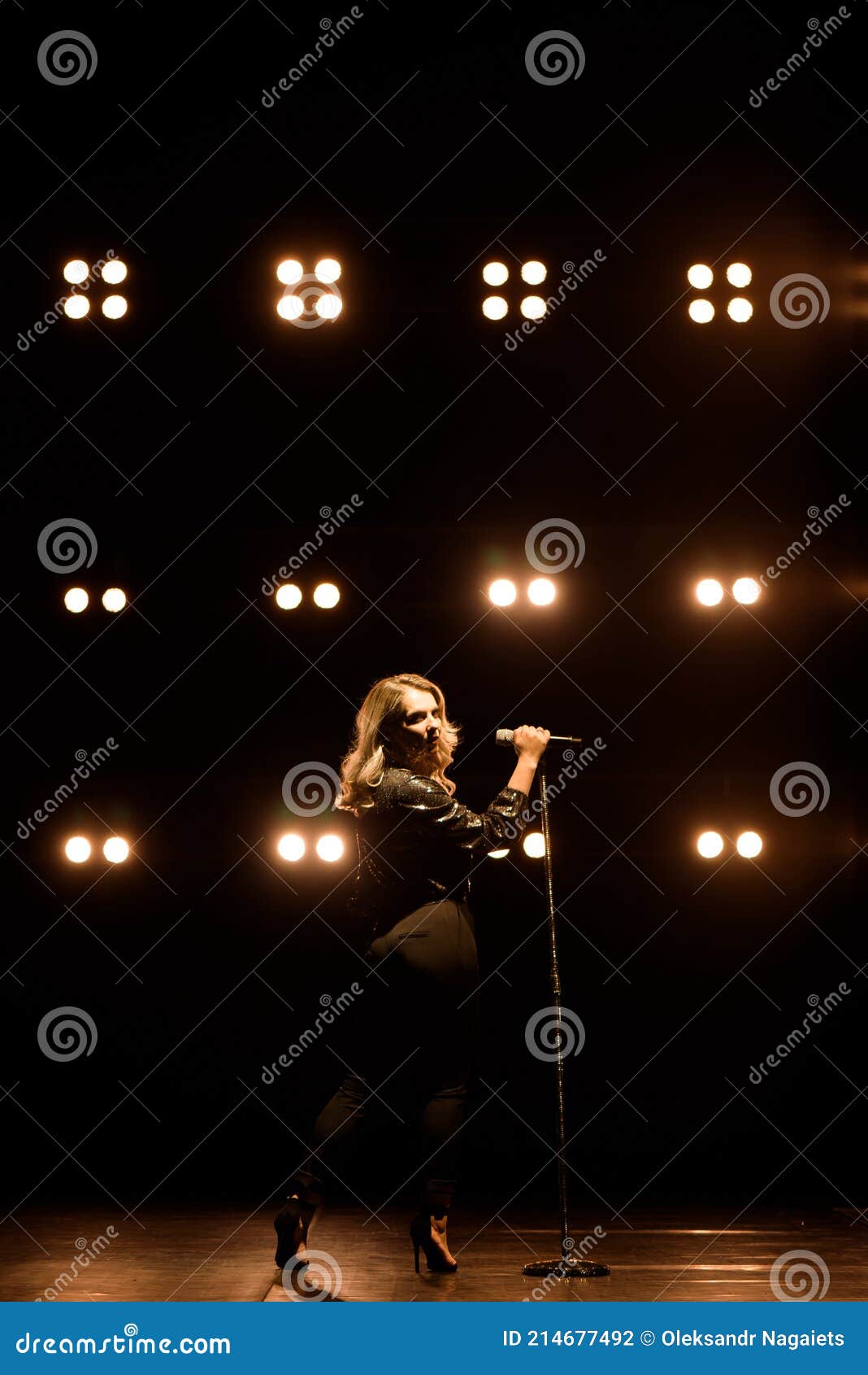 Singer on Scene in the Club. Bright Stage Lighting. Stock Photo - Image ...