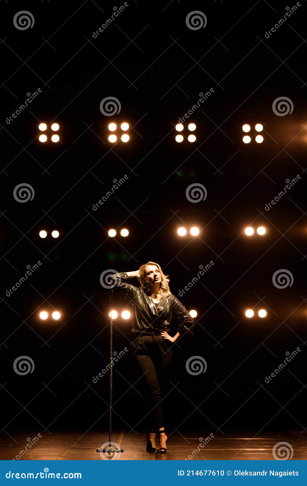 Singer on Scene in the Club. Bright Stage Lighting. Stock Photo - Image ...