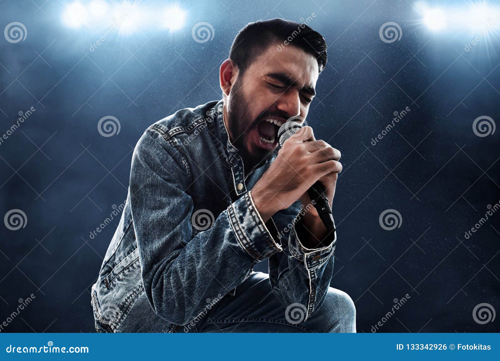 Singer Singing with Microphone on the Stage Stock Photo - Image of ...