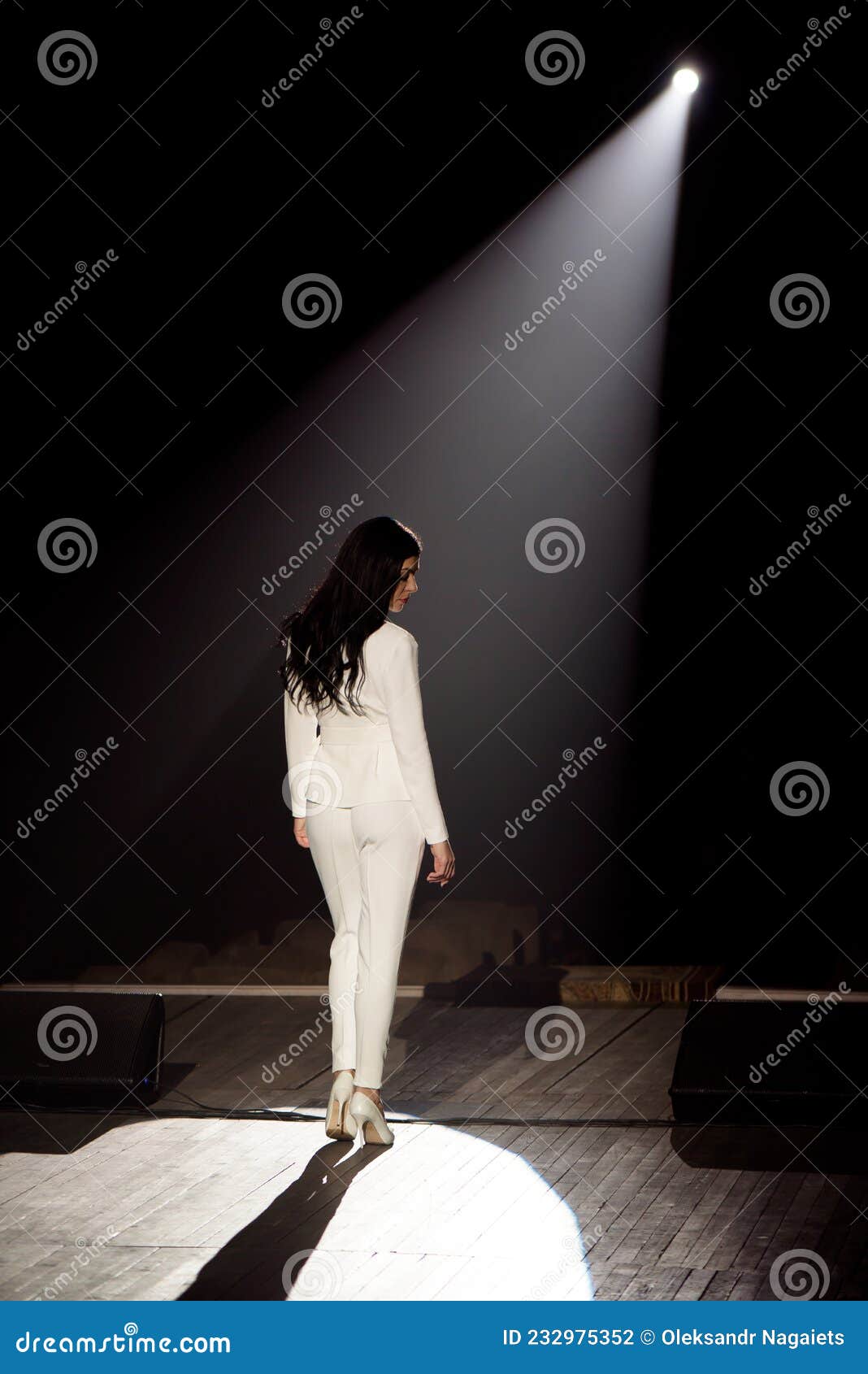 Singer on Stage in a Beam of White Light. Stock Photo - Image of ...
