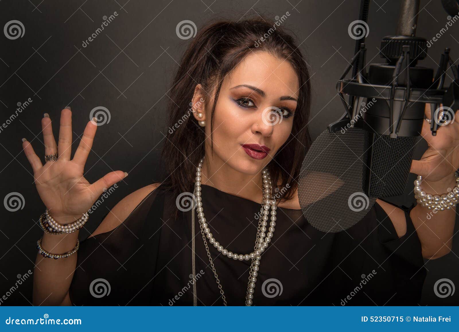 Singing Woman with Microphone Stock Image - Image of face, musician ...