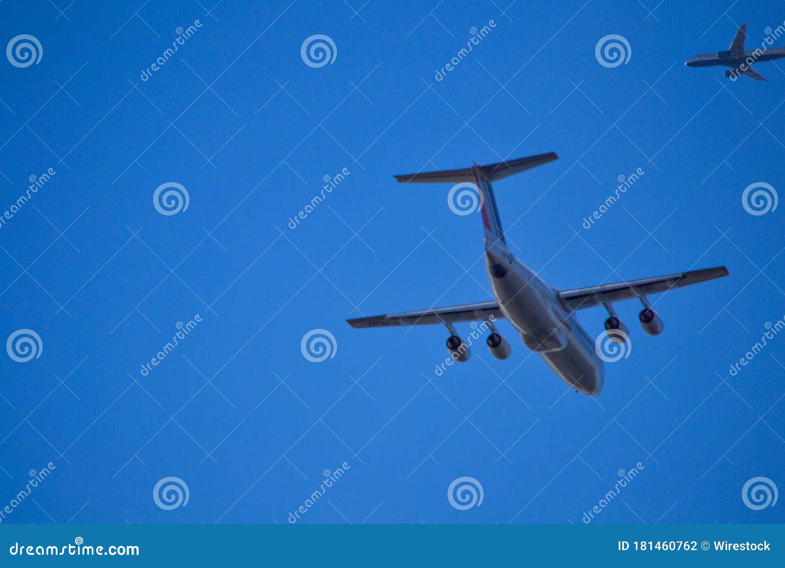 Single Airplane Flying in the Blue Sky Stock Photo - Image of ...