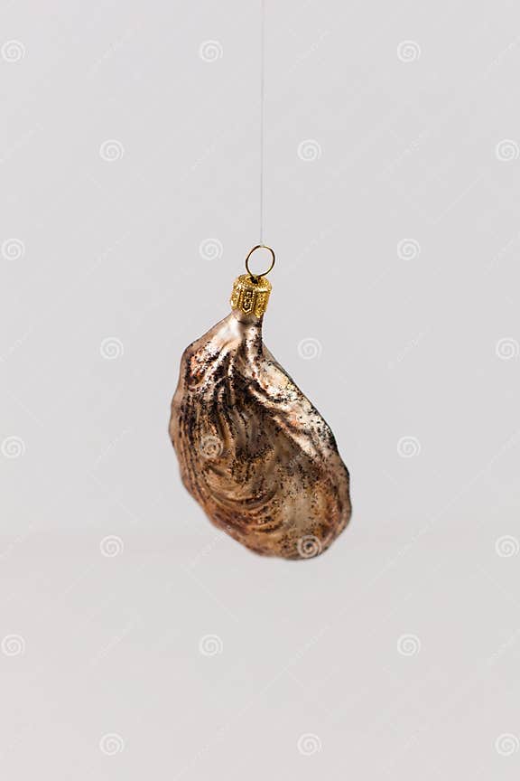 A Single Bauble in the Shape of an Oystershell. Stock Image - Image of ...