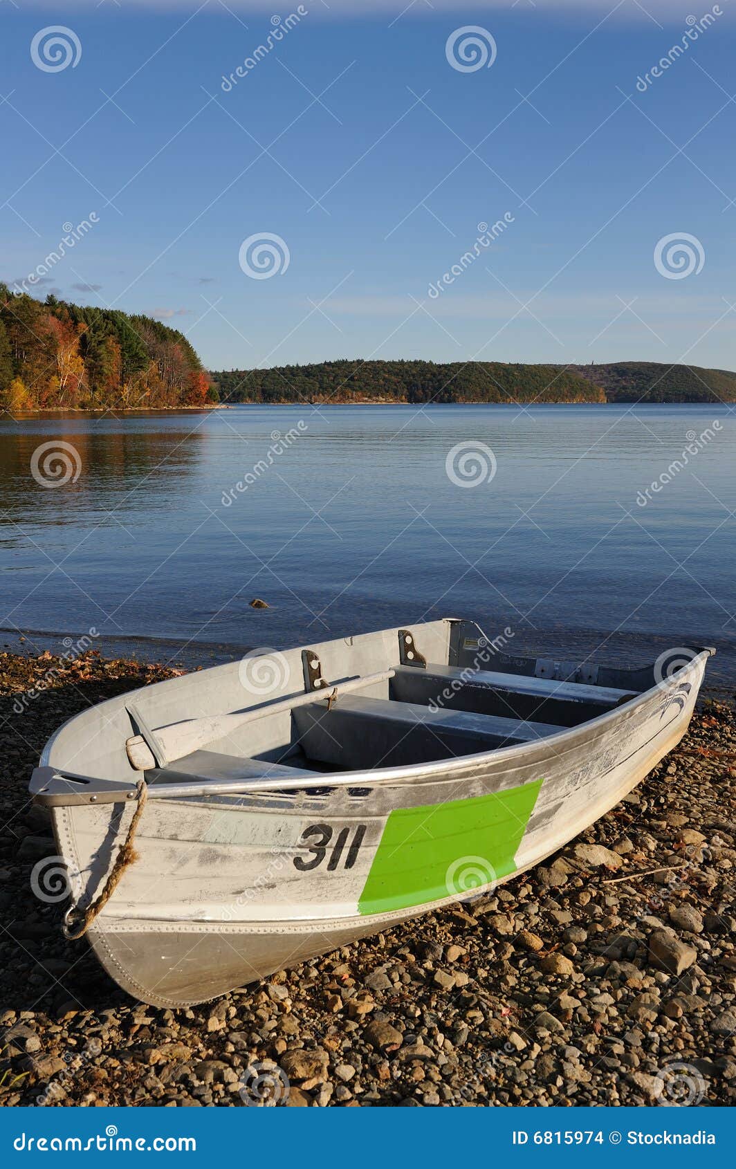 Single boat on the bank stock photo. Image of blue, boats - 6815974