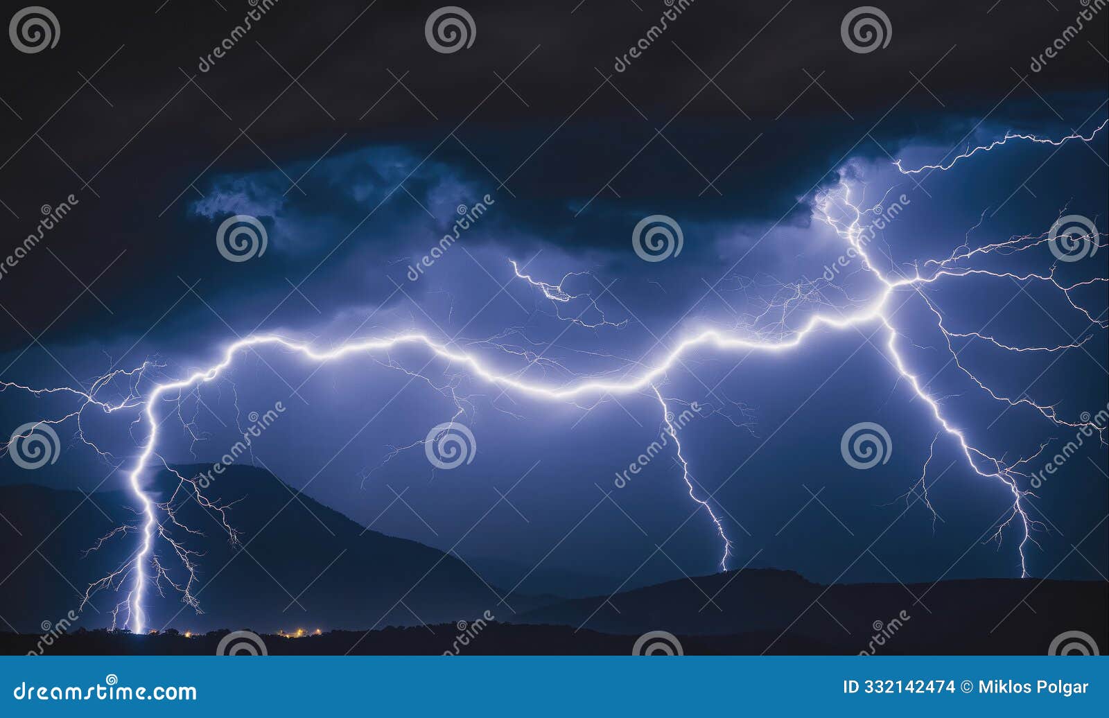 A Single Bolt of Lightning Strikes the Night Sky Over a Mountain Range ...
