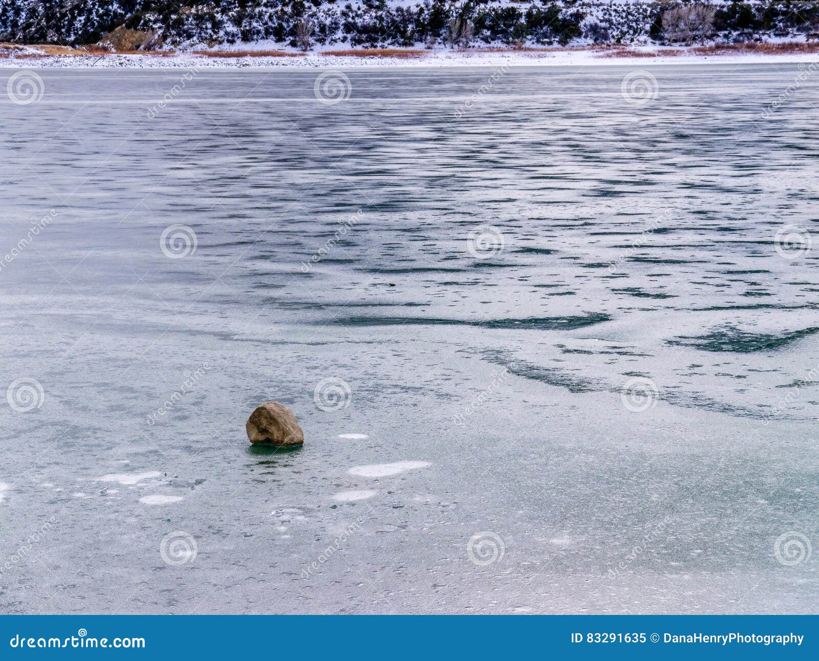 Boulder on Surface of Frozen Lake Stock Image - Image of rock, outdoor ...