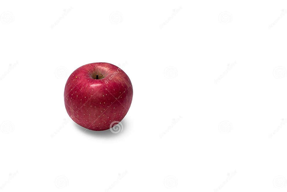 Single Bright Red Apple on a White Surface, with a Shadow Cast on it ...