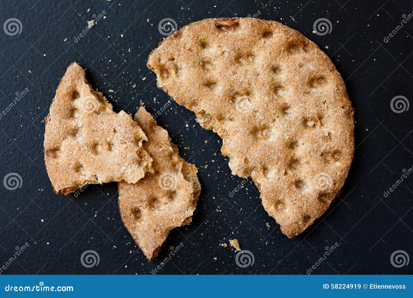 Single Broken Rye Crispbread from Above Isolated on Black. Stock Image ...