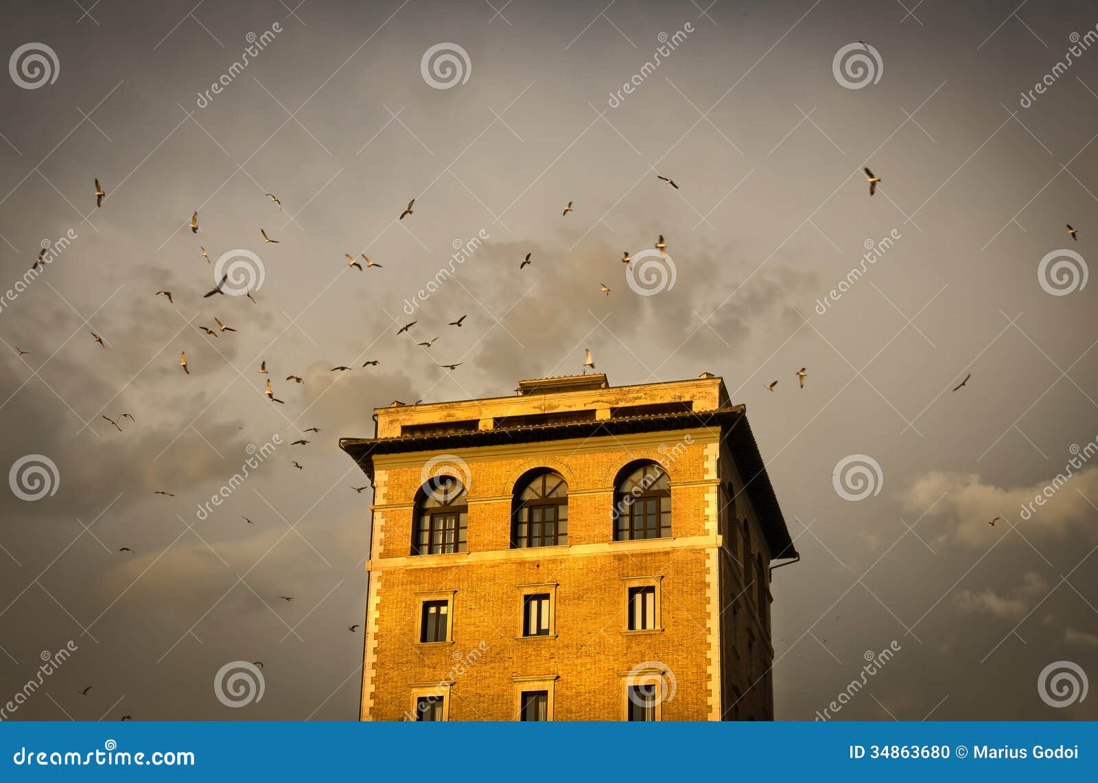 Single Building with Birds Above Stock Photo - Image of dramatic, birds ...