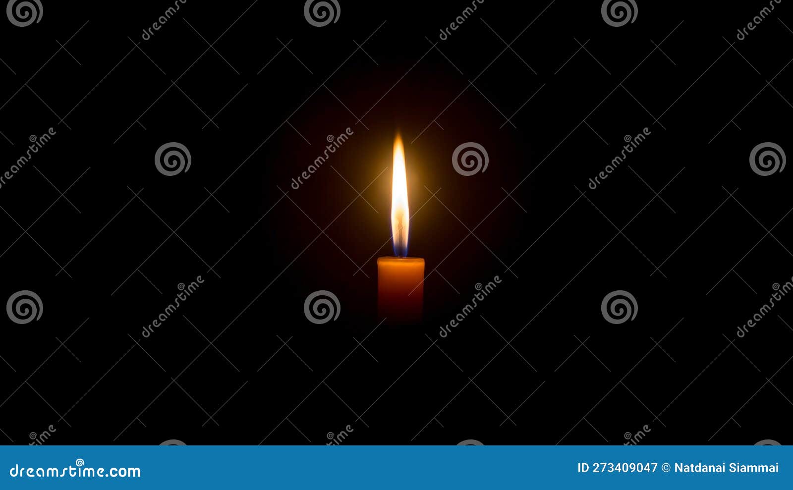 A Single Burning Candle Flame or Light Glowing on an Orange Cand Stock ...