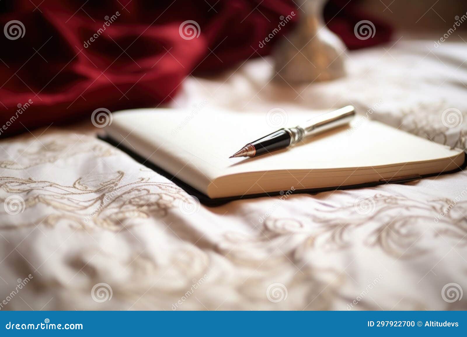 A Single Calligraphy Pen Lying on the White Sheets of a Sketchbook ...