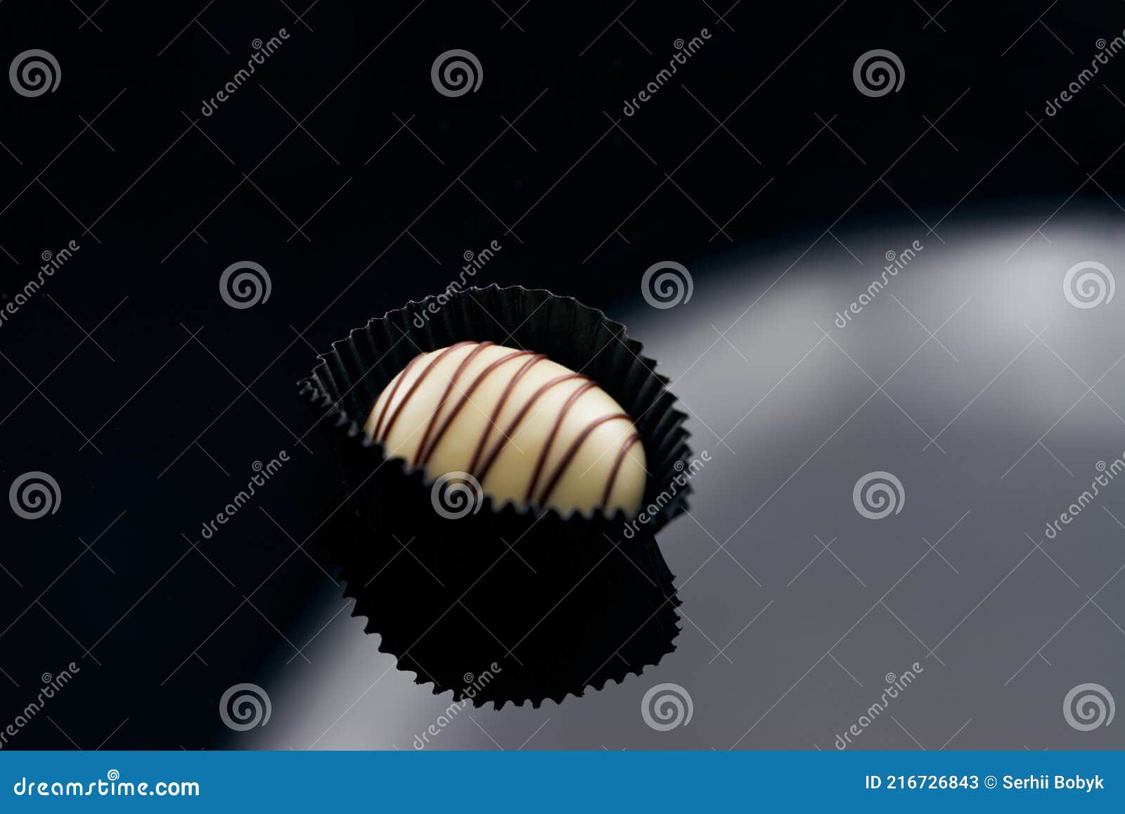 Single Chocolate Candy on Glazed Surface Stock Image - Image of organic ...