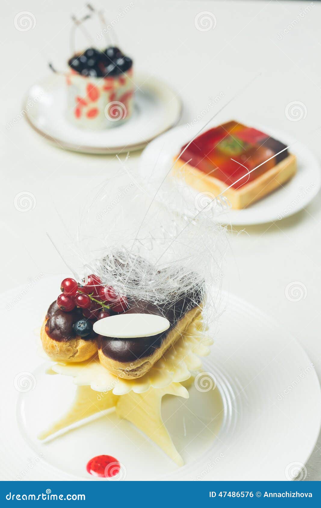 Single chocolate eclair stock photo. Image of cafes, culinary - 47486576