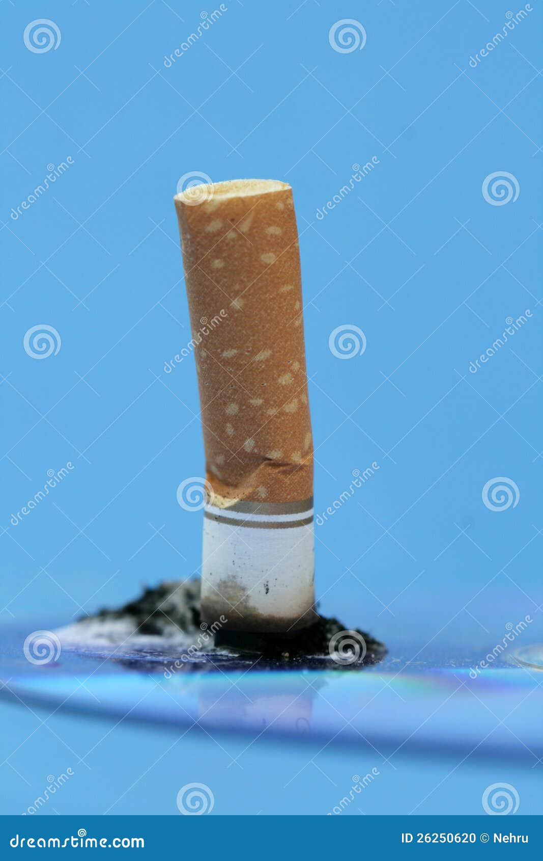 Single cigarette with ash stock photo. Image of smoking - 26250620