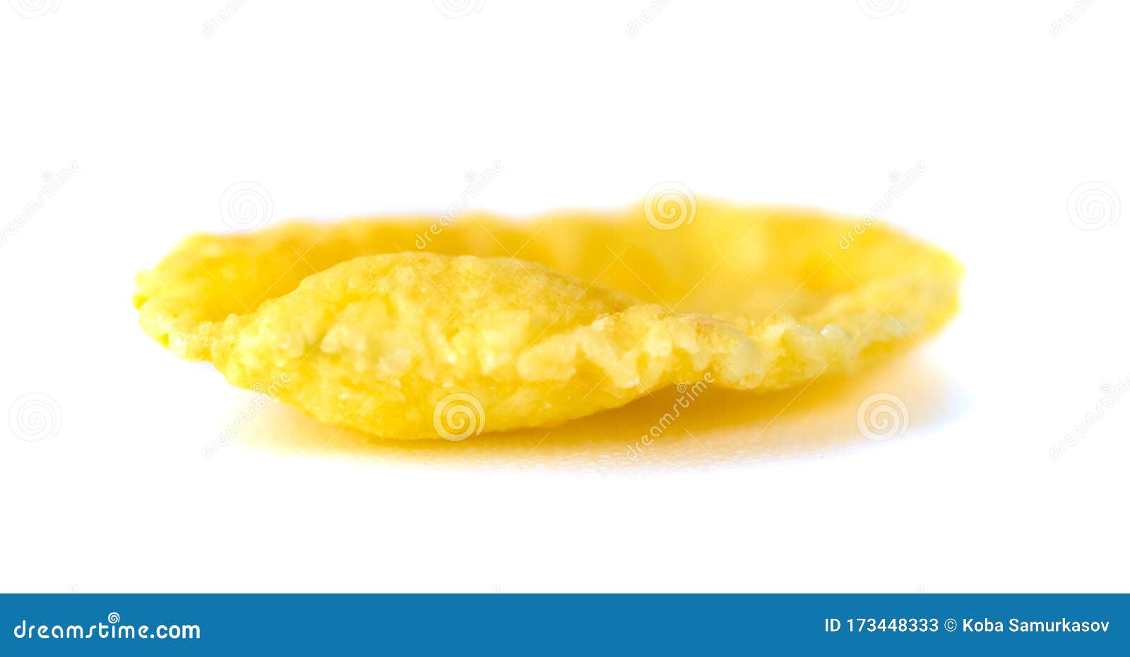 Single Cornflake On A Plate. Symbol Of Famines And Poverty.Isolated On ...