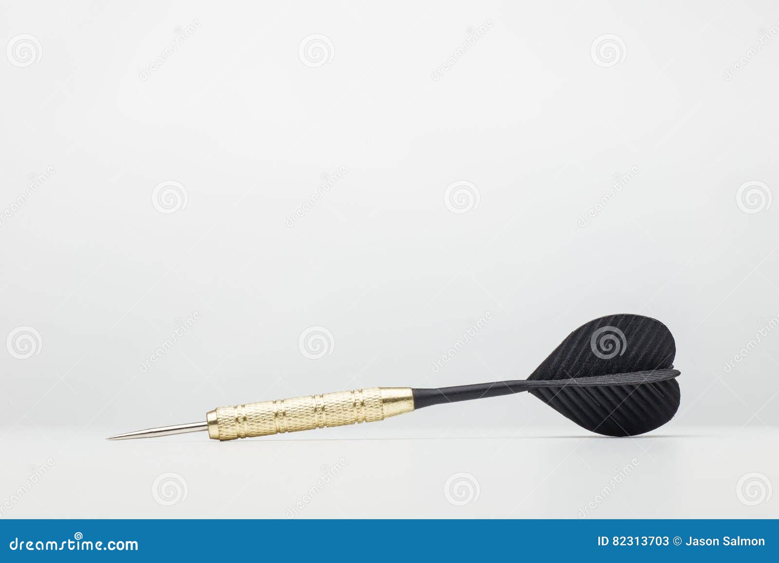 Single dart on white stock image. Image of black, sharp - 82313703