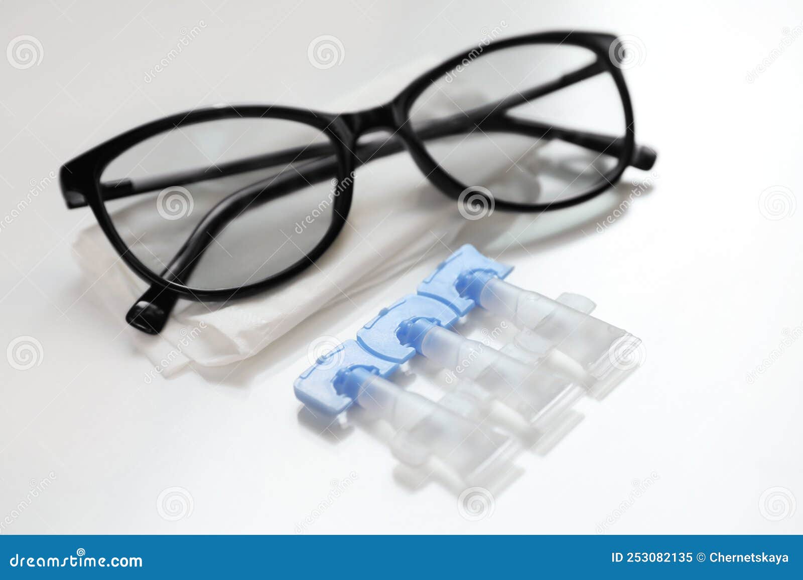 Single Dose Eye Drops, Glasses and Fabric on Table Stock Image - Image ...