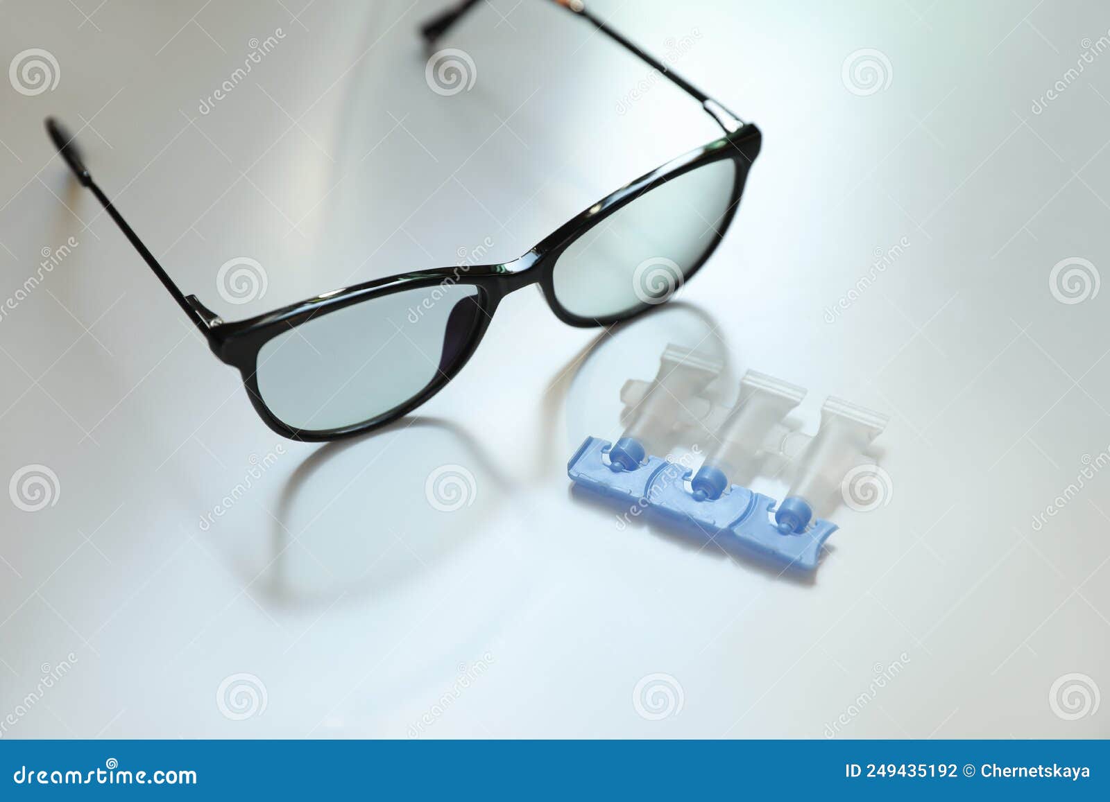 Single Dose Eye Drops and Glasses on White Table Stock Photo - Image of ...