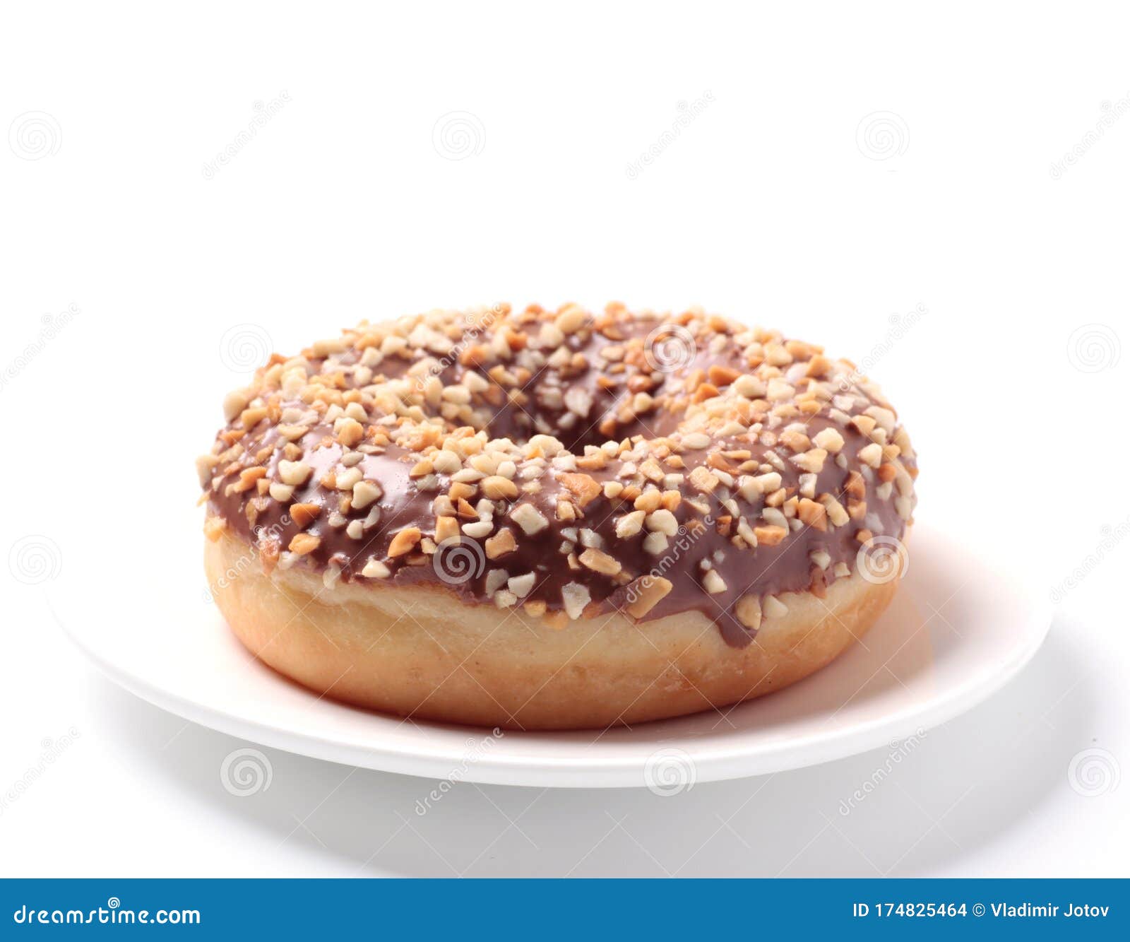A Single Doughnut on a White Plate Stock Photo - Image of bakery, donut ...