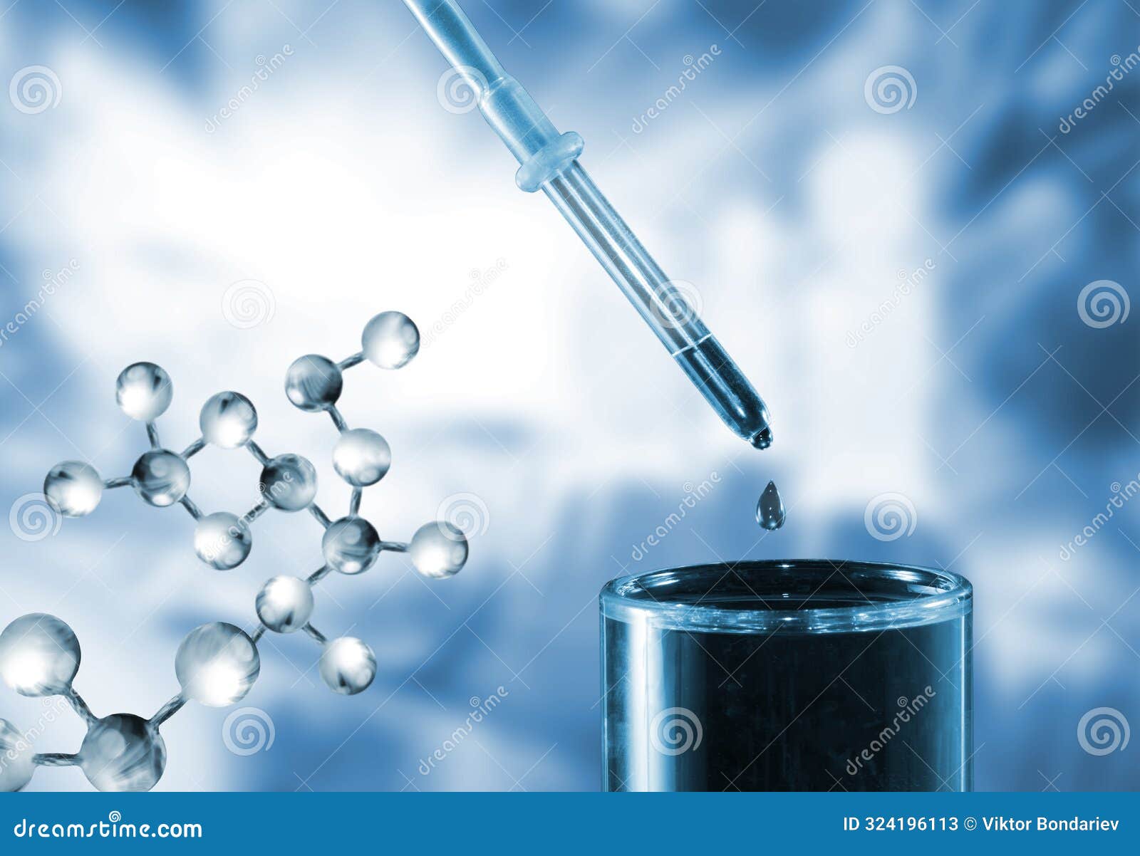 A Single Drop of Liquid Falling into a Test Tube with Molecular ...