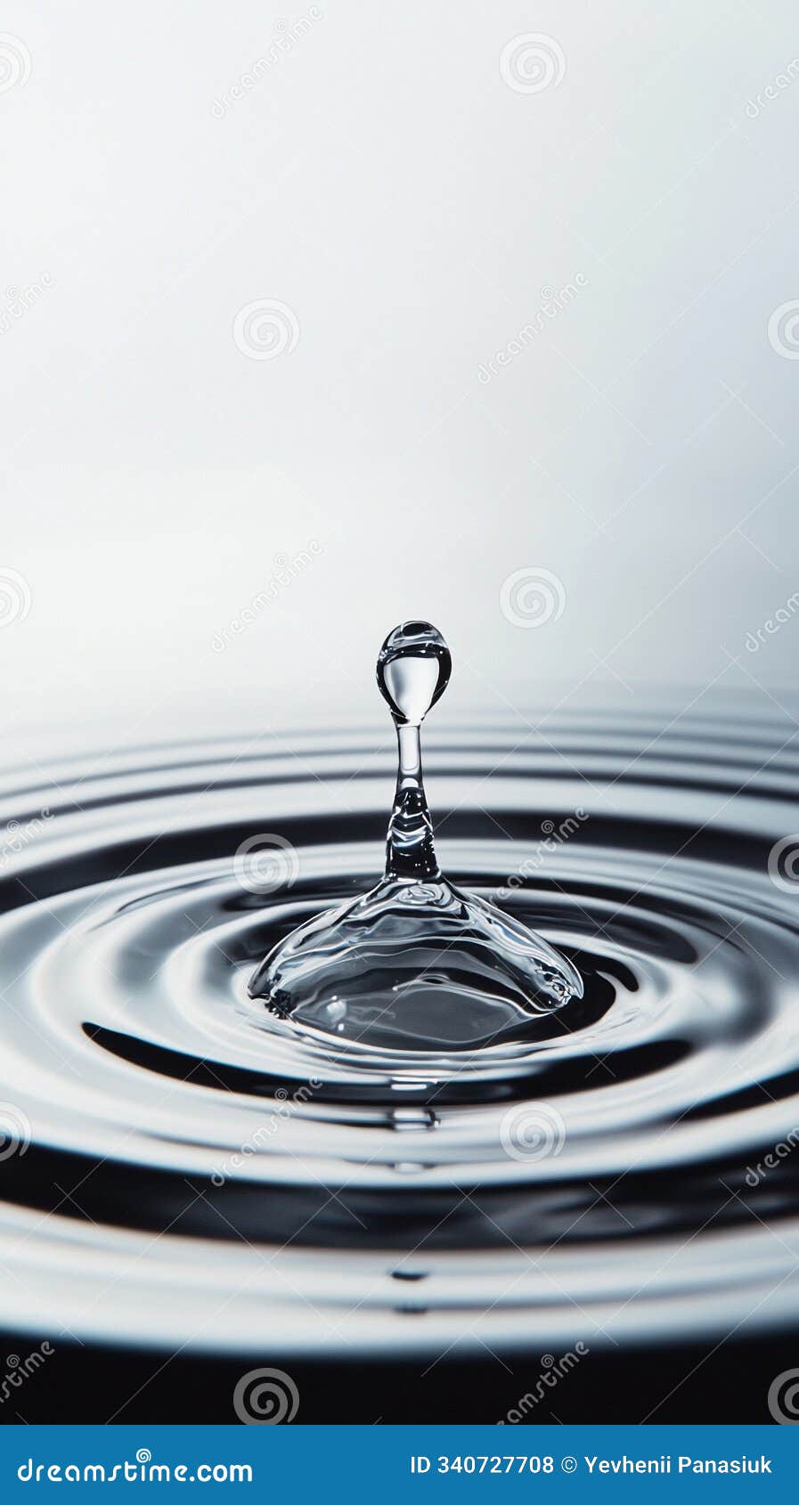 A Single Drop of Water Creates Ripples in a Still Pool Stock ...