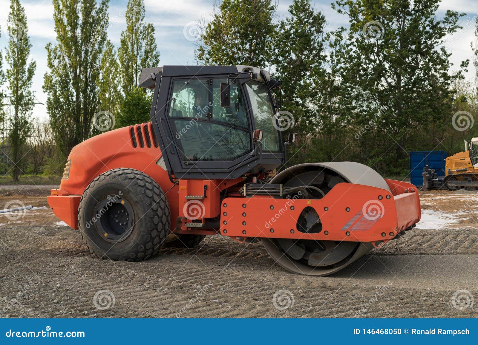 A Single-drum Compactor Also Known As a Steam Roller Stock Photo ...