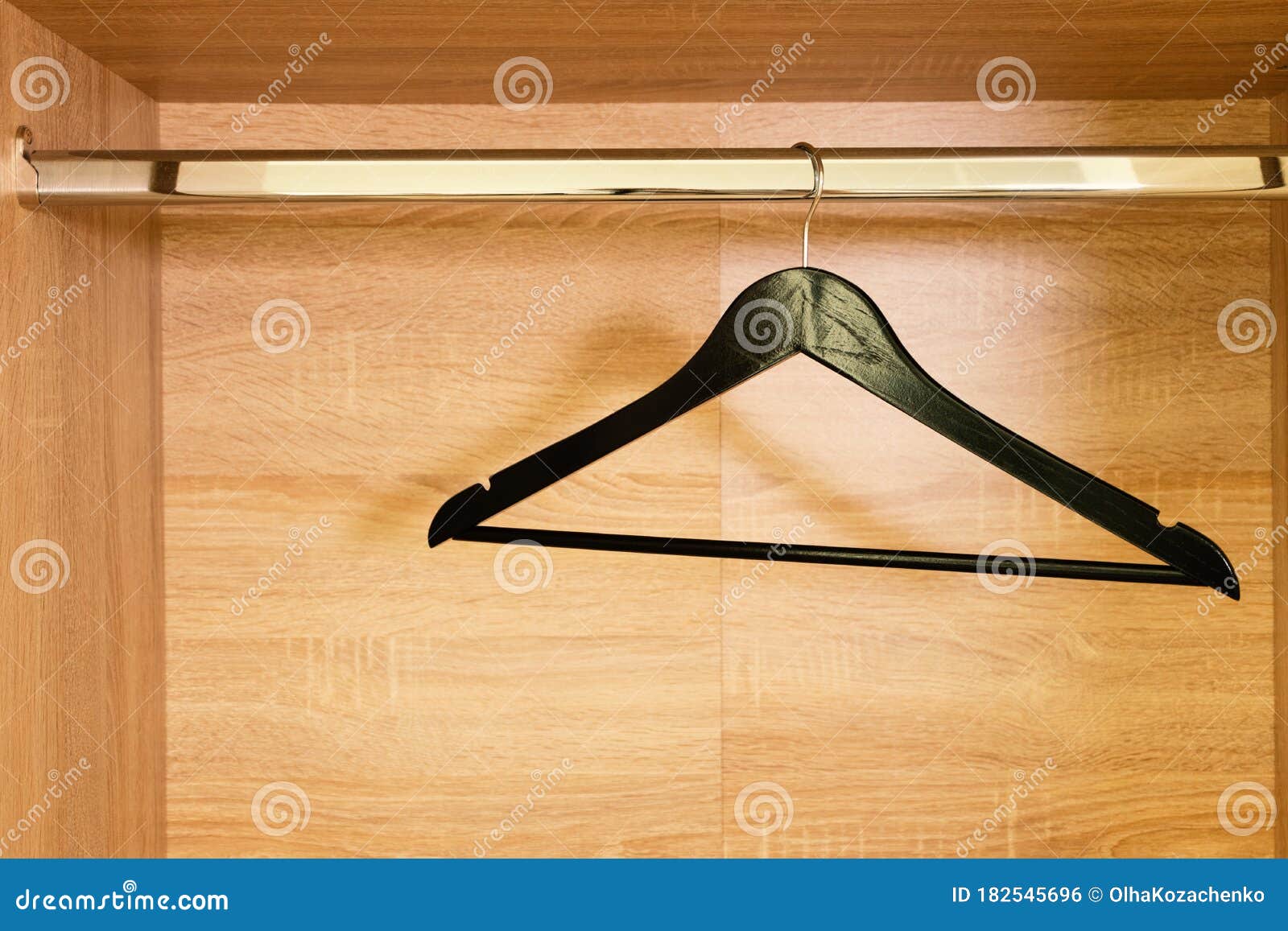 Single Empty Black Clothing Rack Hanging on Coathanger in Closet Stock ...