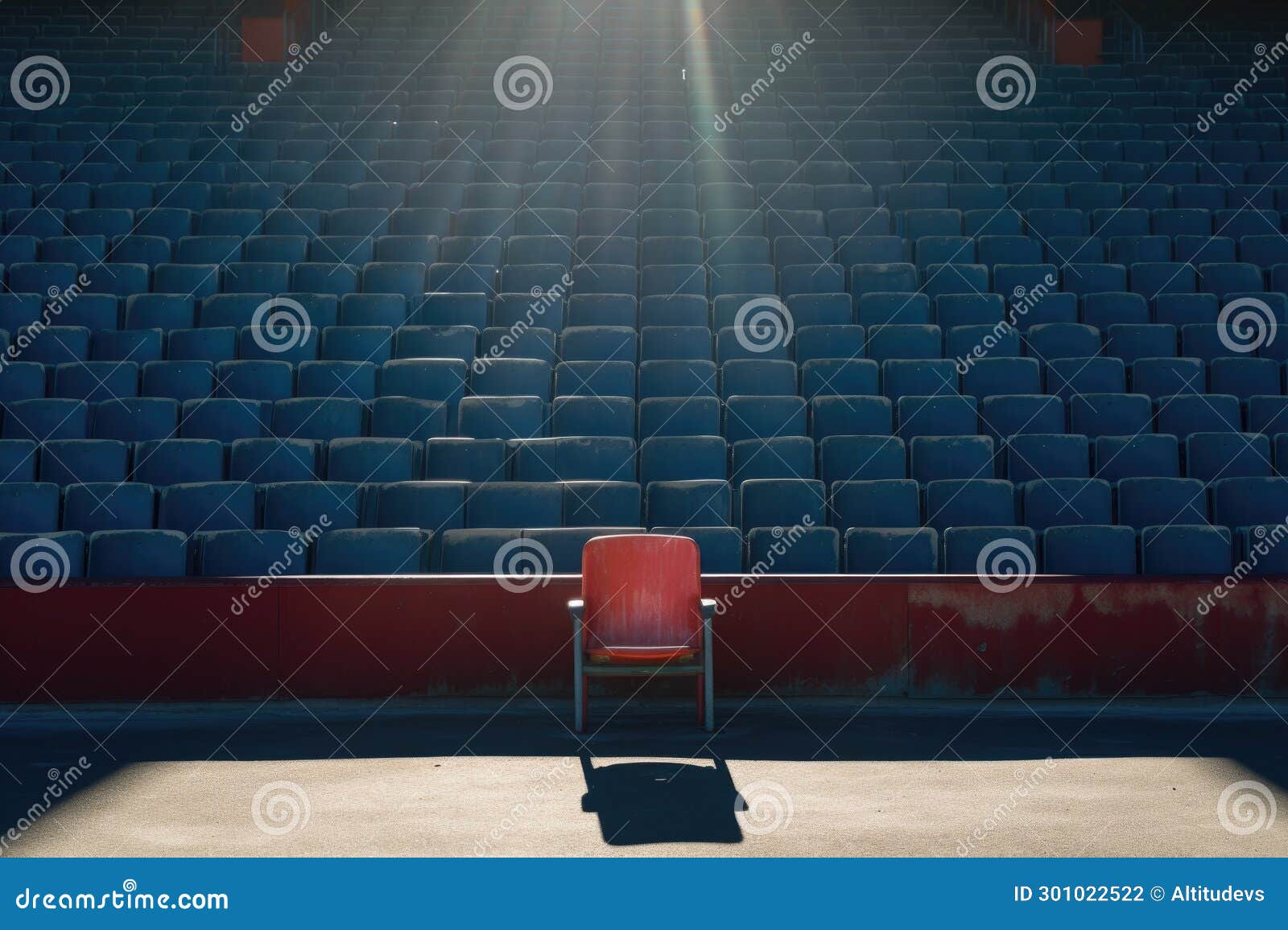 A Single Empty Seat Highlighted by Sunlight among Occupied Stadium ...