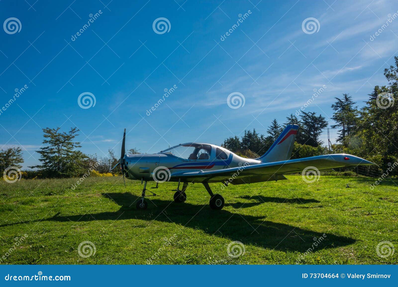 A Single-engine Plane on a Small Field, Abkhazia. Stock Photo - Image ...
