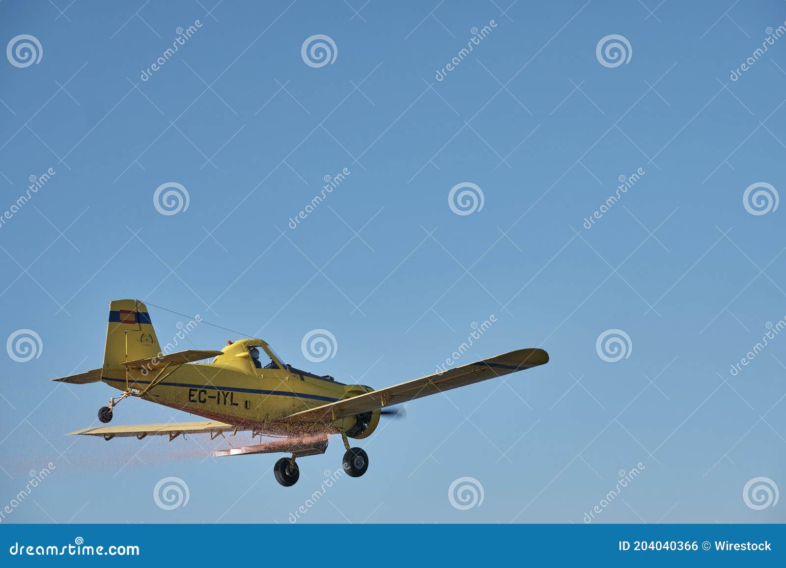 Single-engine Propeller Airplane Flying in a Perfectly Clear Blue Sky ...