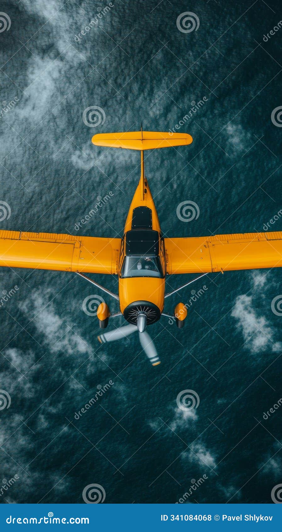 Single Engine Ultralight Prop Plane Flying in the Blue Sky with White ...