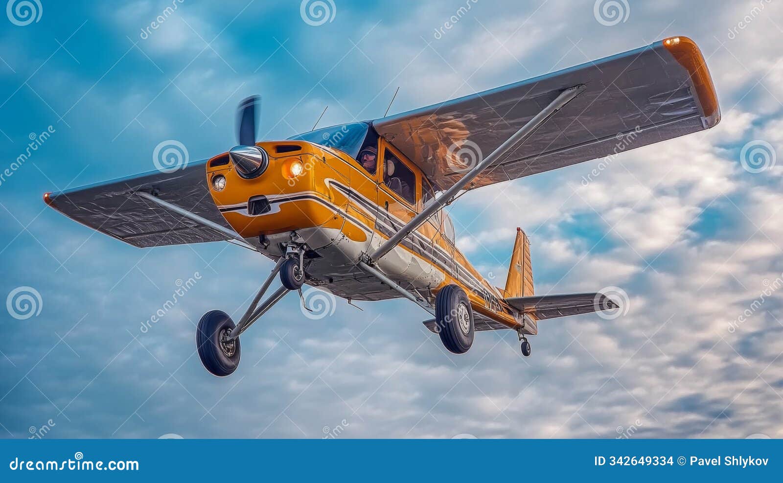 Single Engine Ultralight Prop Plane Flying in the Blue Sky with White ...