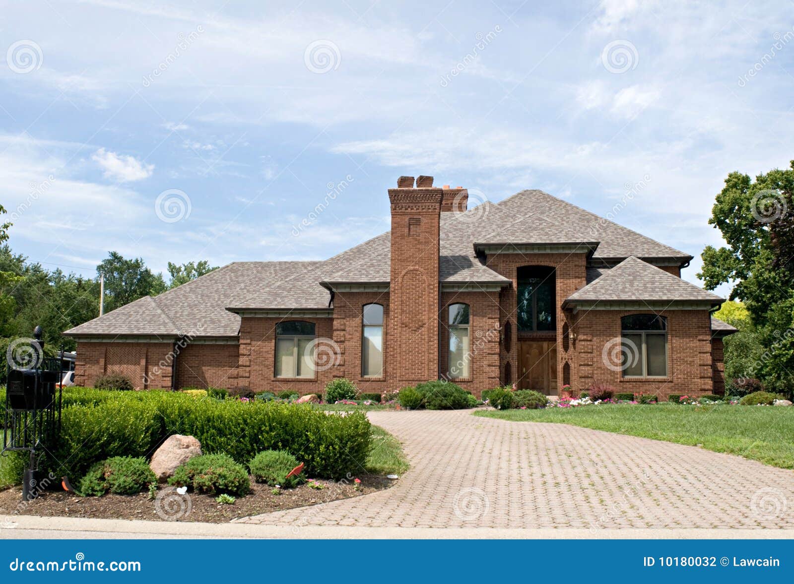 Single Family Brick Home stock photo. Image of clouds - 10180032