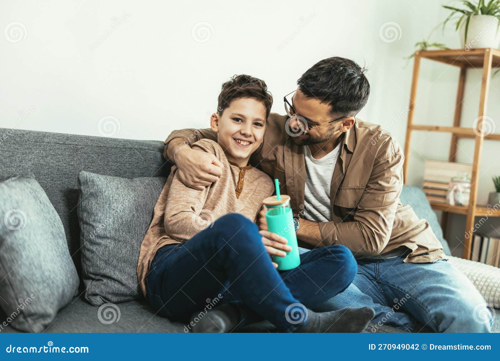 Single Father and Son Spending Time Together at Home Stock Photo ...
