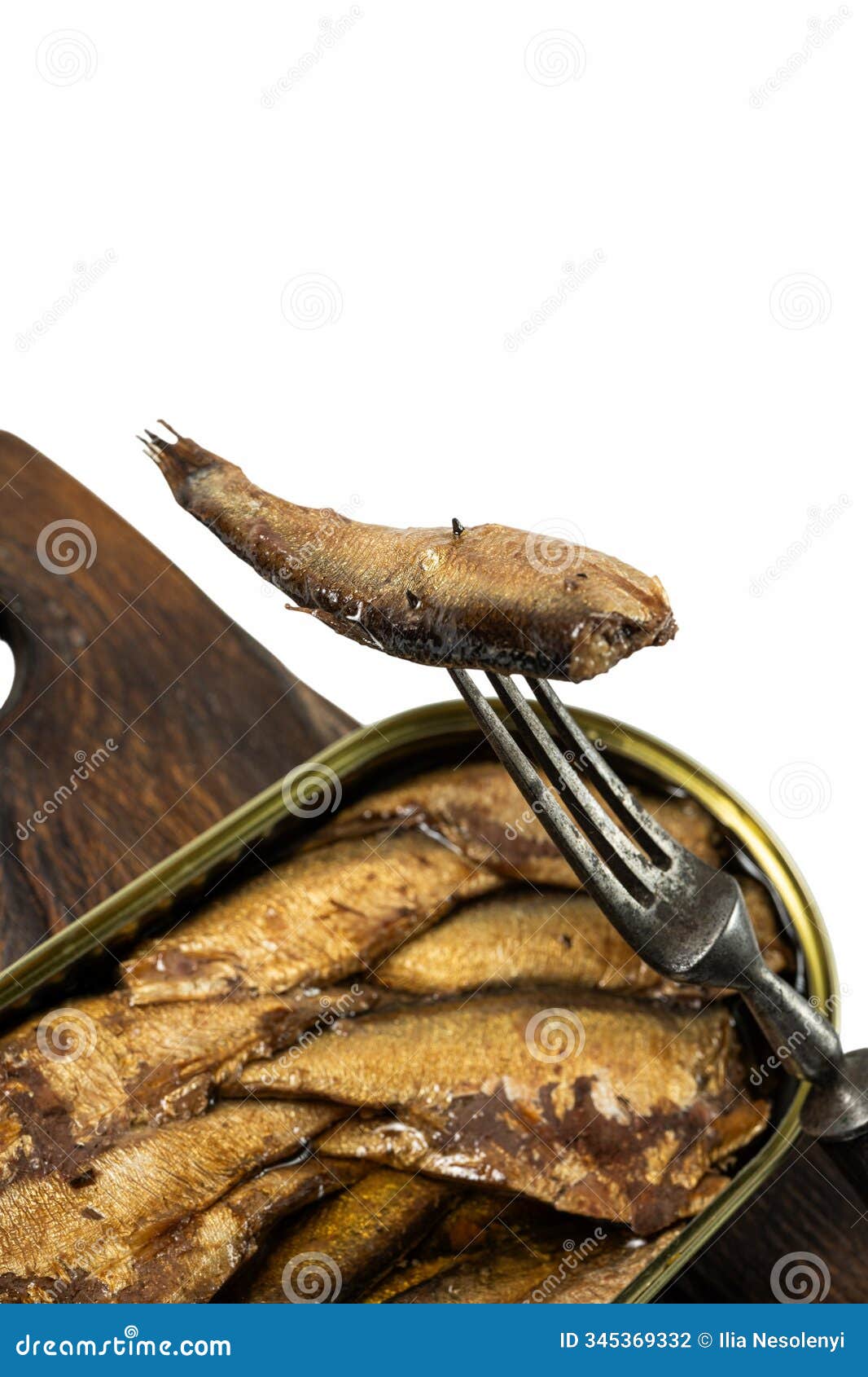 A Single Fish is Presented on a Fork Above an Open Can, Showcasing the ...