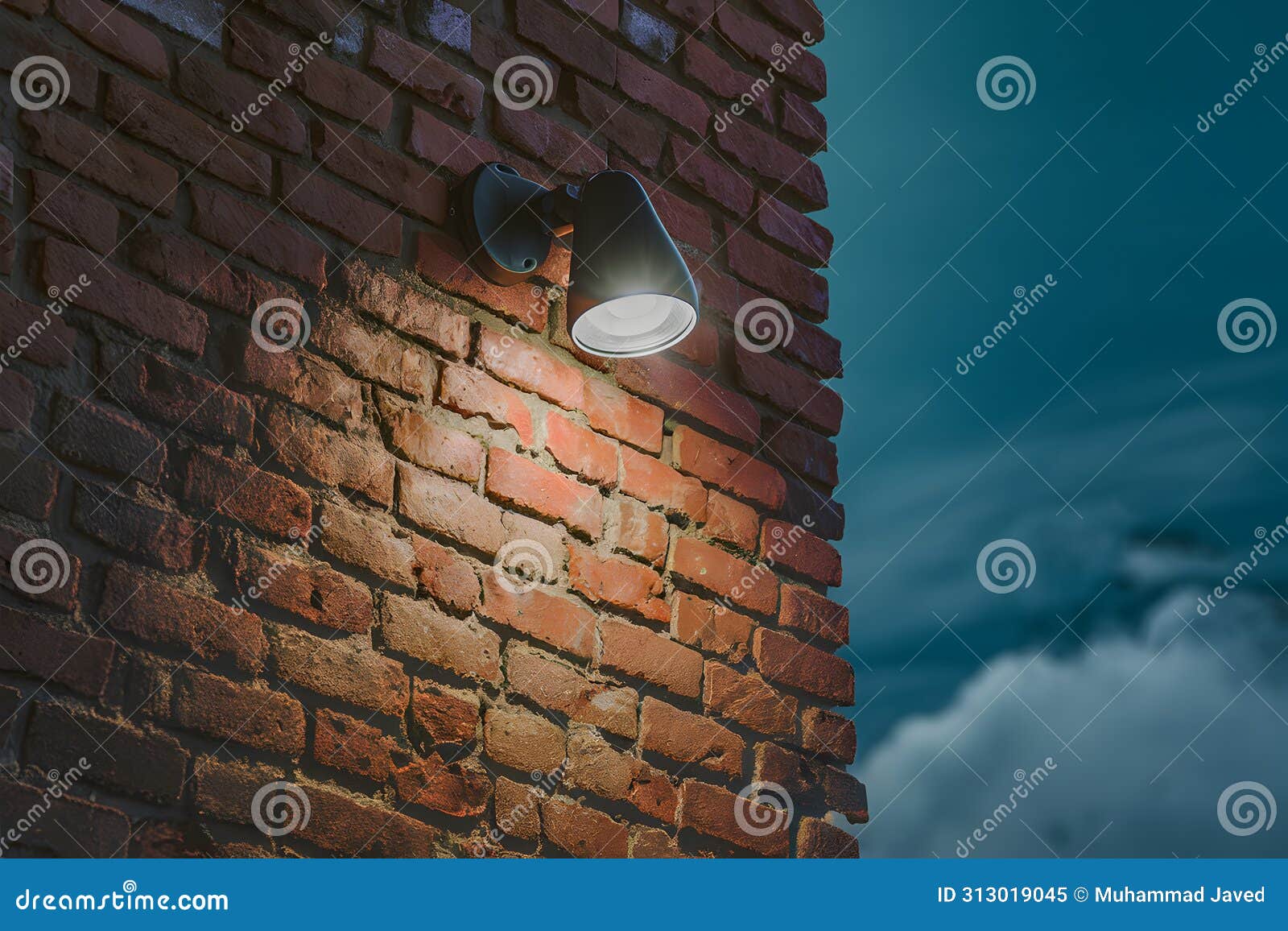 Single Flood Light Partially Illuminates Rustic Brick Wall Stock ...
