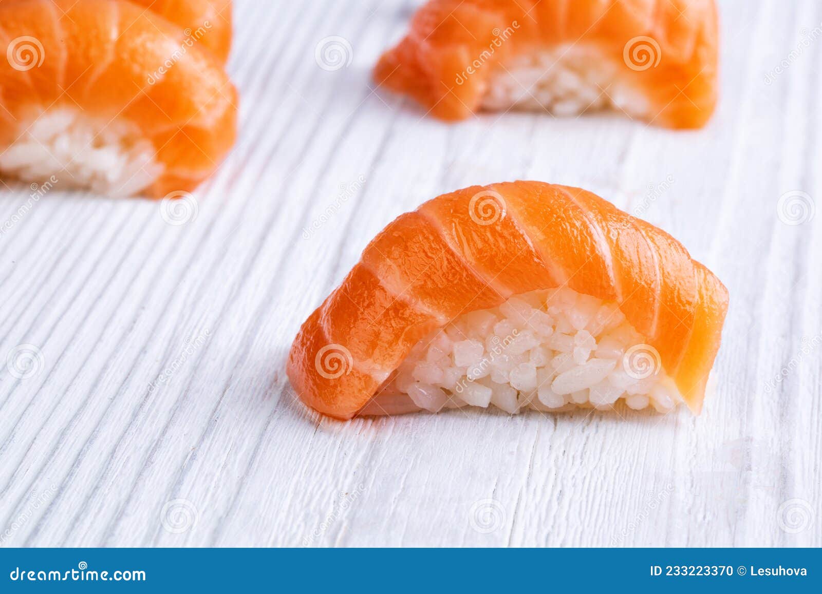 Single fresh salmon sushi stock photo. Image of seafood - 233223370