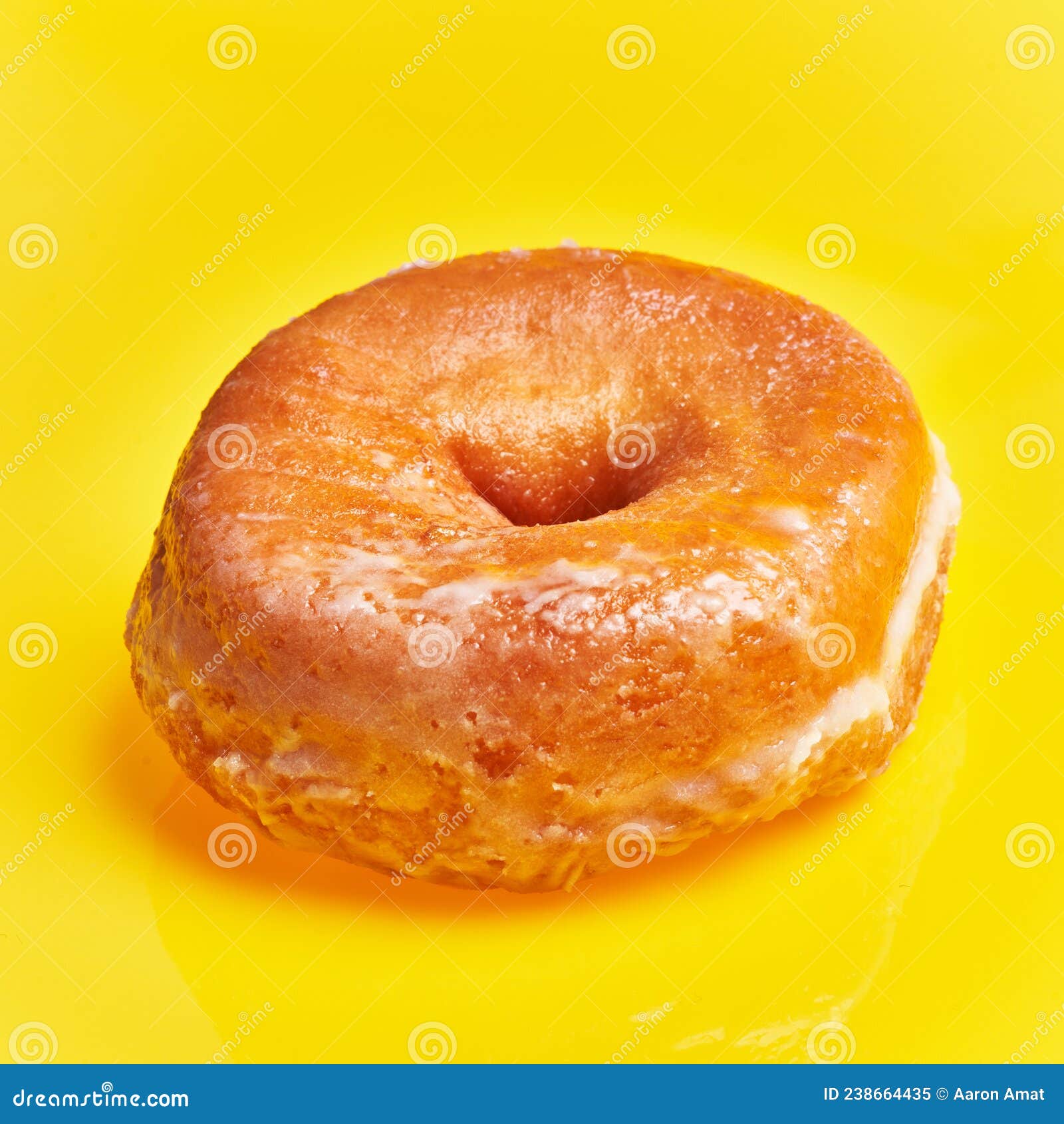 Single Glazed Donut On A Background Royalty-Free Stock Photo ...