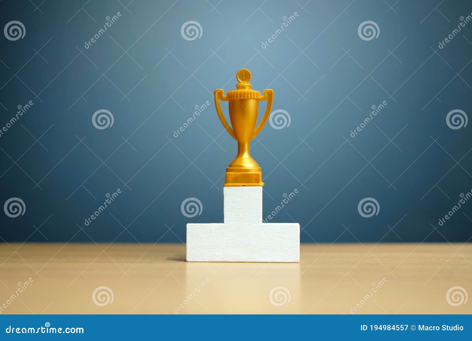 Single Golden Trophy on White Podium Stock Image - Image of puzzle ...