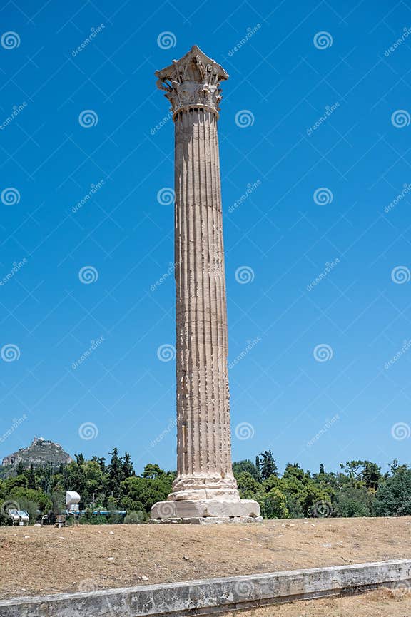 Single Greek Ancient Column on the Ground, Vertical Stock Photo - Image ...