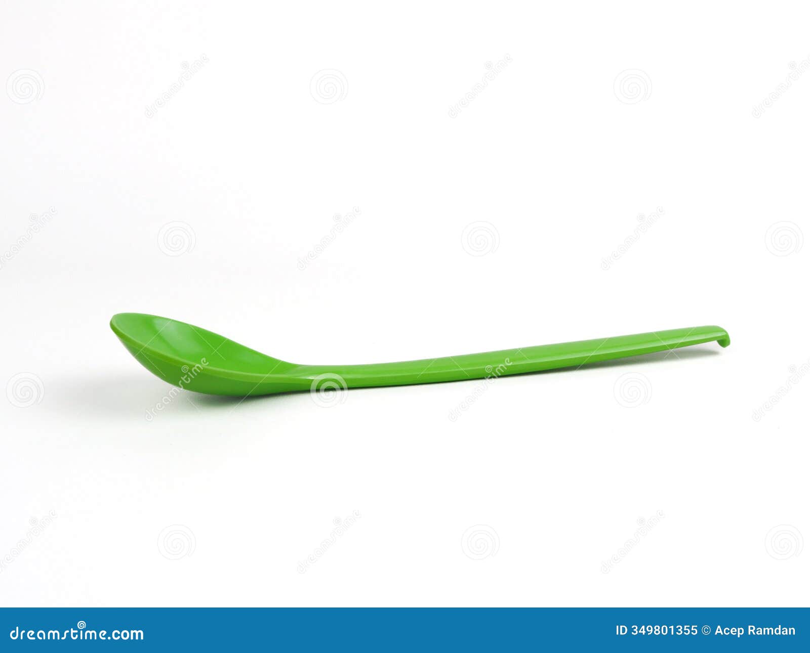 A Single Green Plastic Spoon Isolated on White Stock Image - Image of ...