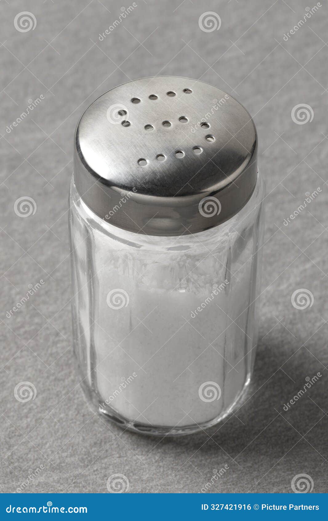 Single Glass Salt Shaker with White Salt Close Up Stock Photo - Image ...
