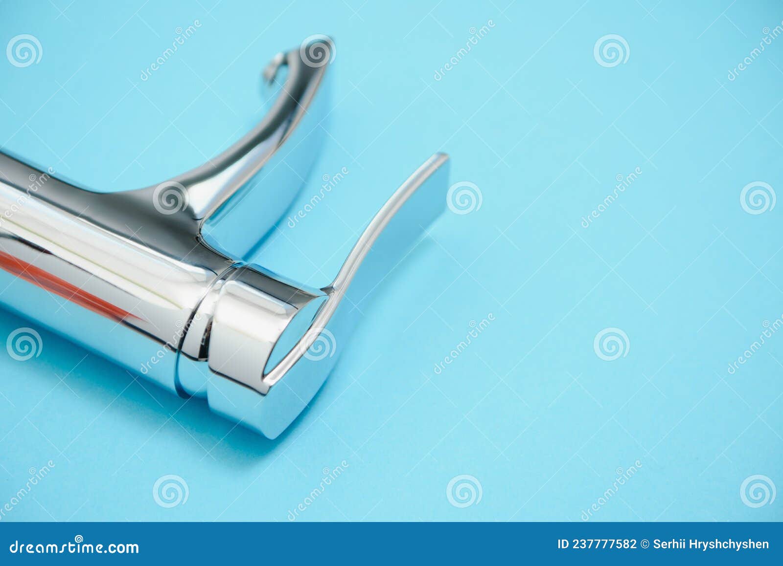 Single Handle Water Tap on Light Blue Background, Closeup Stock Photo ...