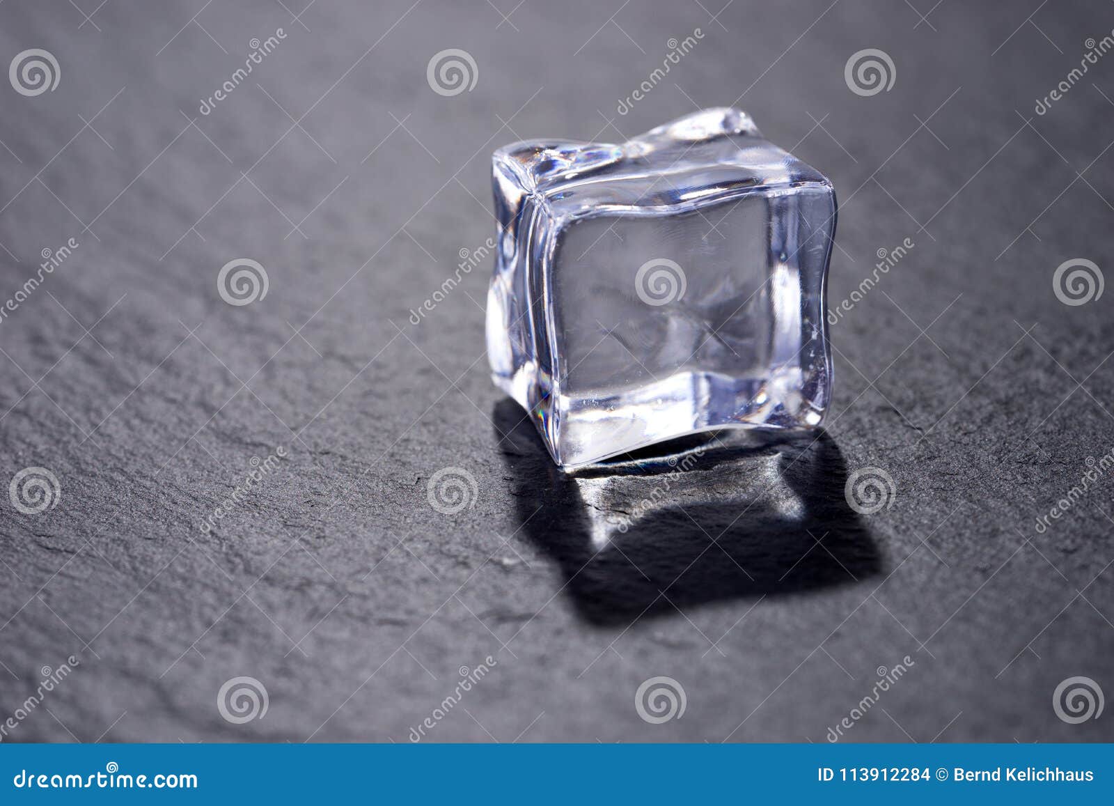 Single Ice Cube Isolated on Black Stock Photo - Image of light ...