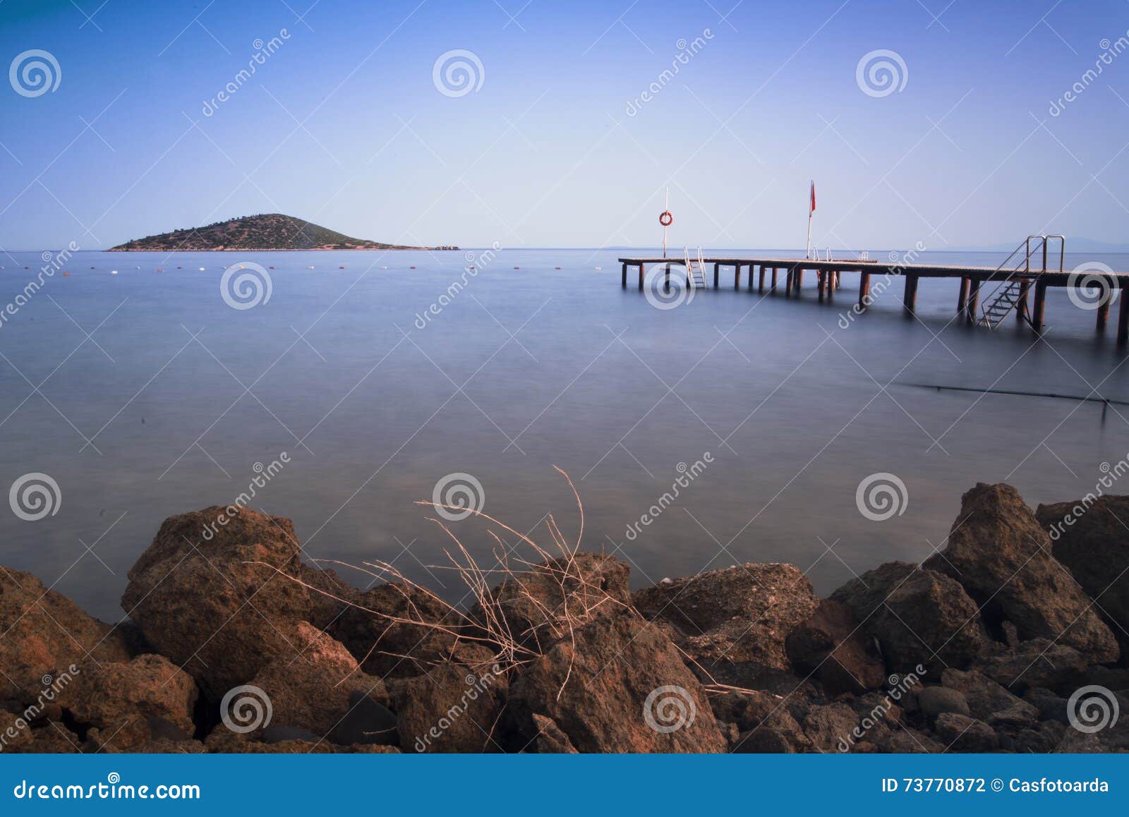 Single island in the sea. stock photo. Image of gumusluk - 73770872