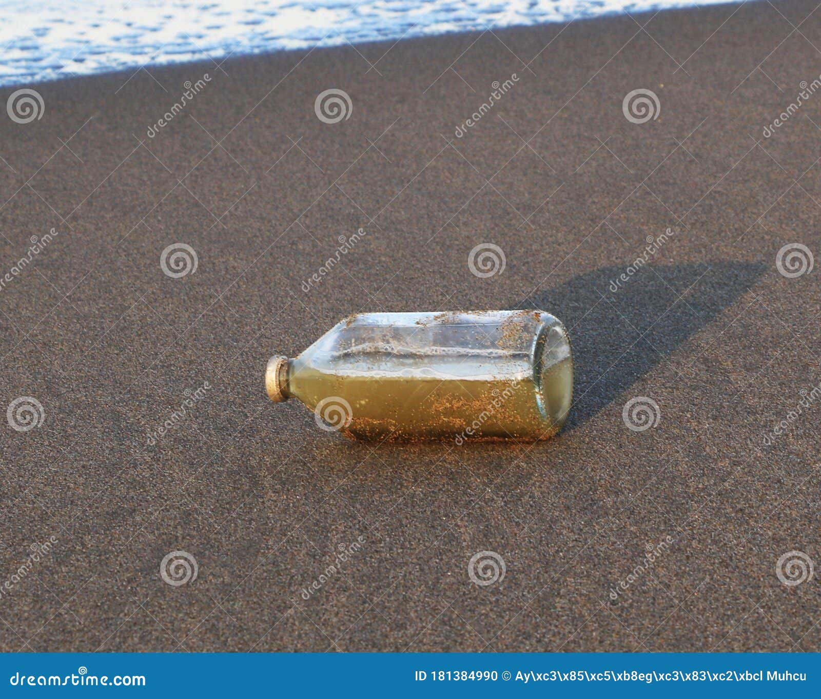 Single Junk Bottle on Clear Beach Stock Photo - Image of human, nature ...